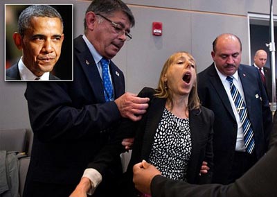 Medea Benjamin interrupted Obama 3 times during national security ...