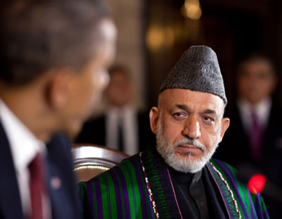 Hamid Karzai says he'll delay signing of US accord on American troops ...